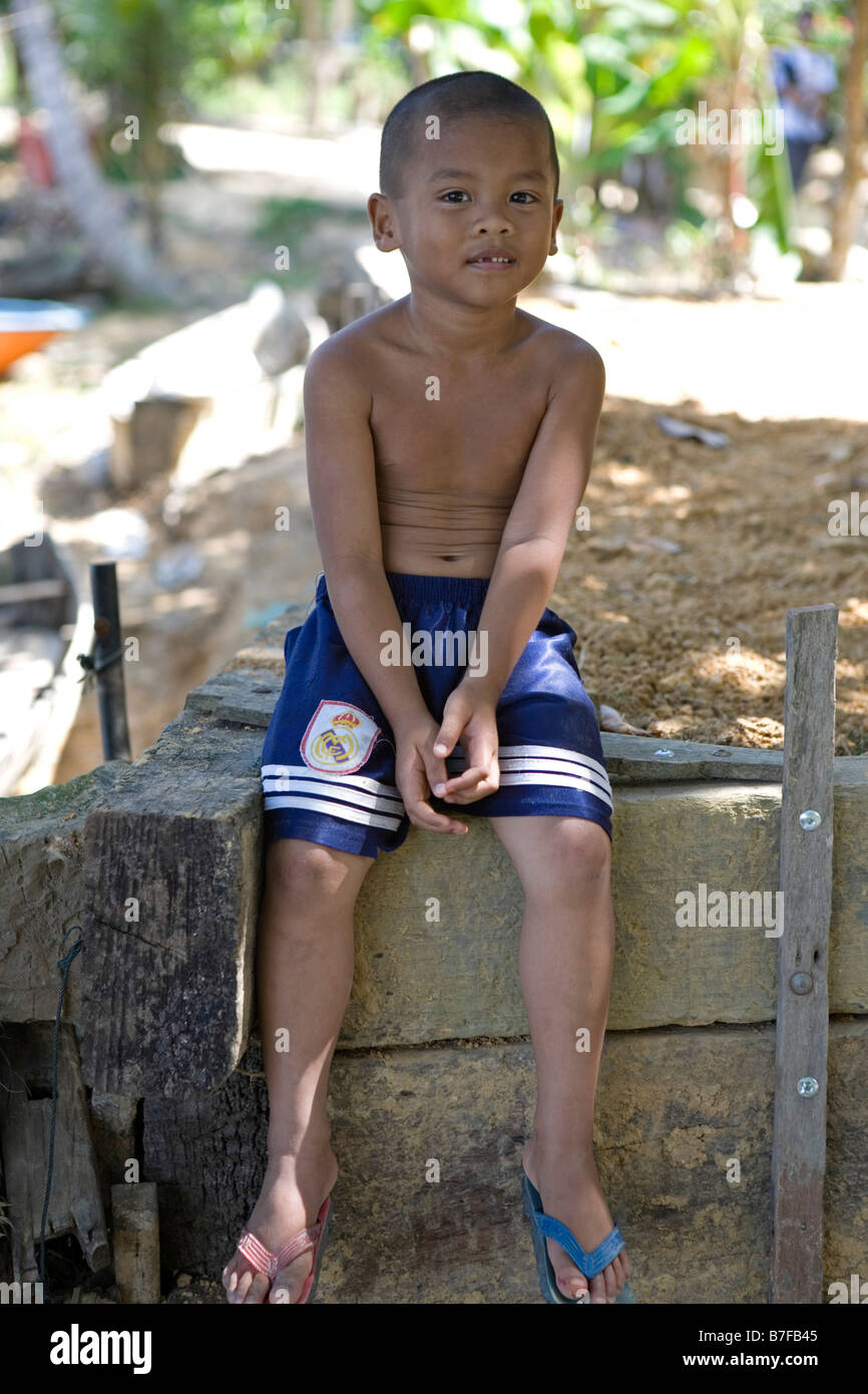 Young Malay boy in a village, Perak, Malaysia Stock Photo - Alamy
