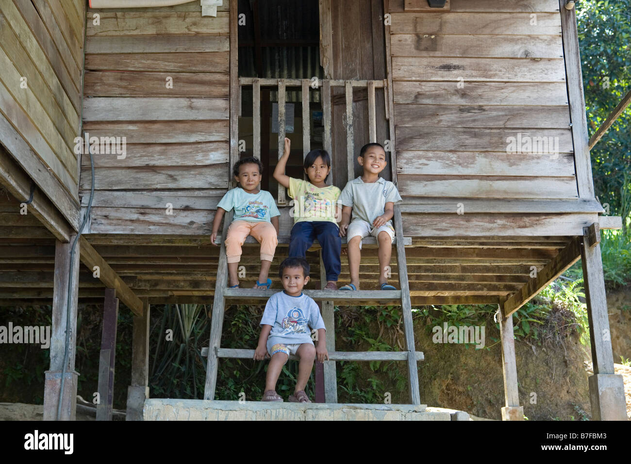Four Malay children in a village, Perak, Malaysia Stock Photo - Alamy