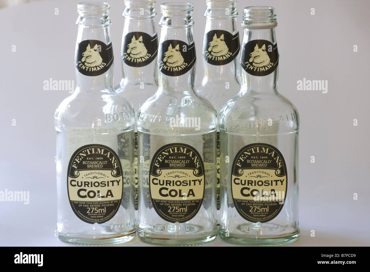 Fentimans Curiosity Cola empty bottles Stock Photo - Alamy