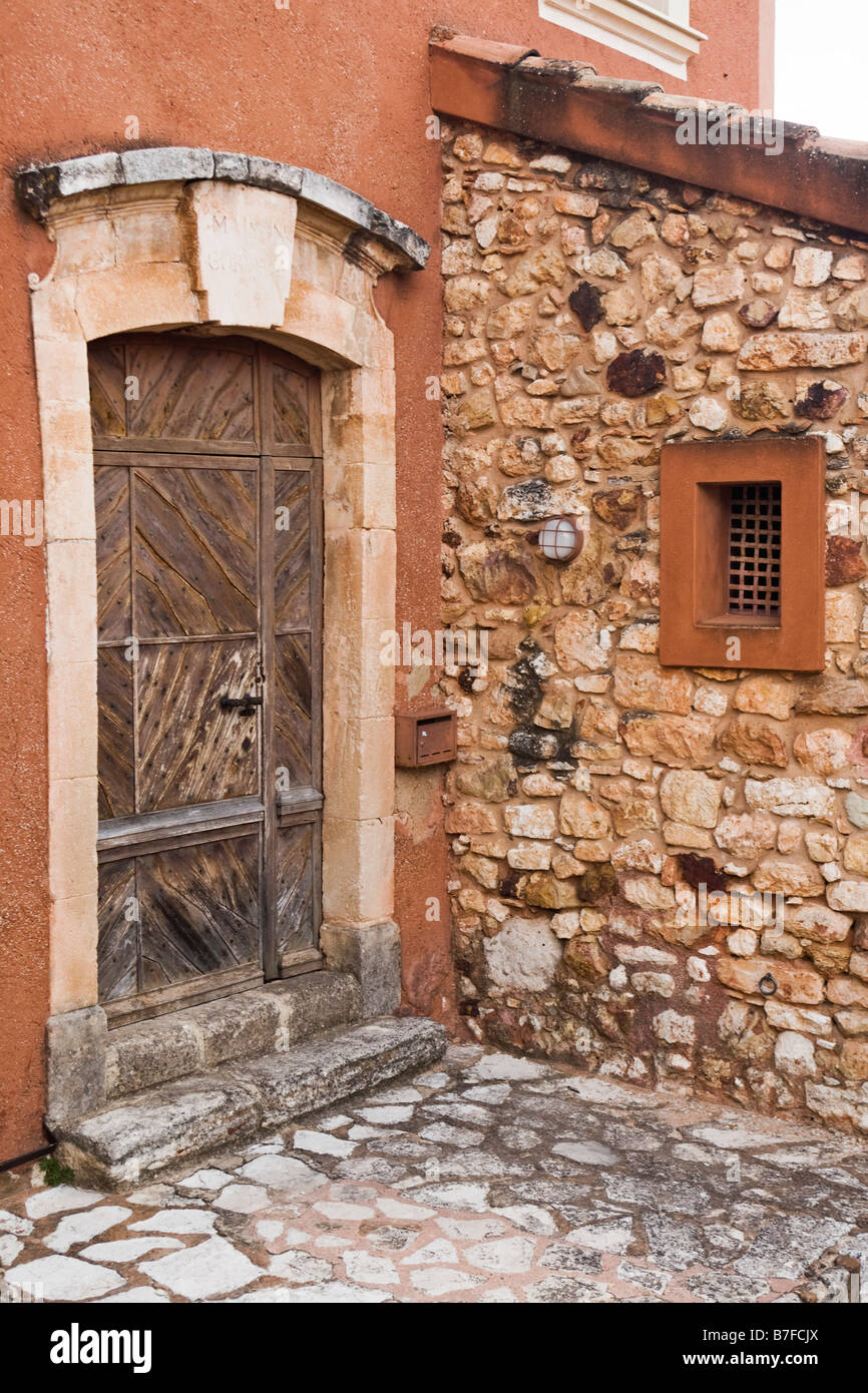 Ochre color stone house in Roussillon, Vaucluse, Provence, France Stock ...