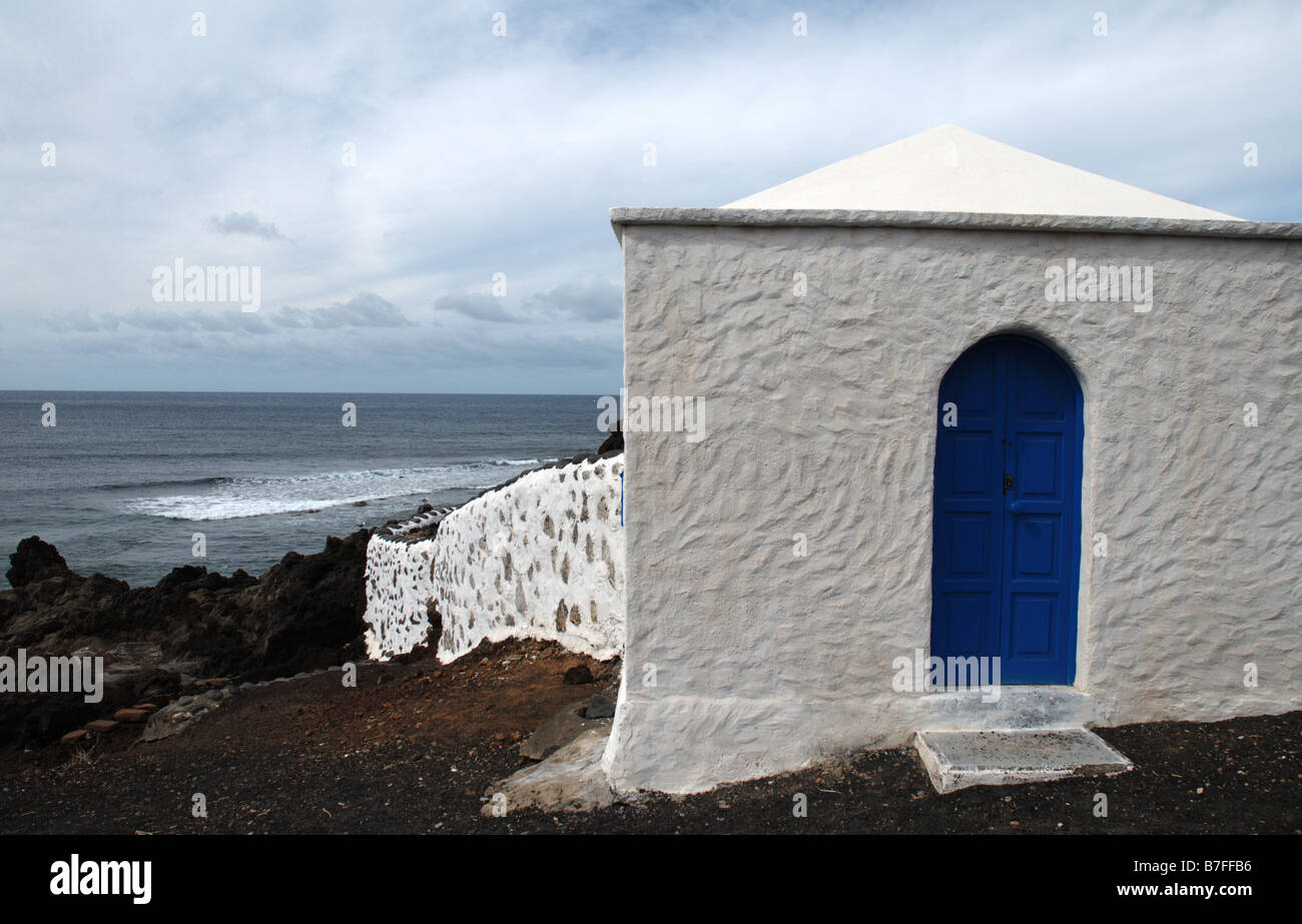 White washed building with a bright blue door in Lanzarote Canary ...