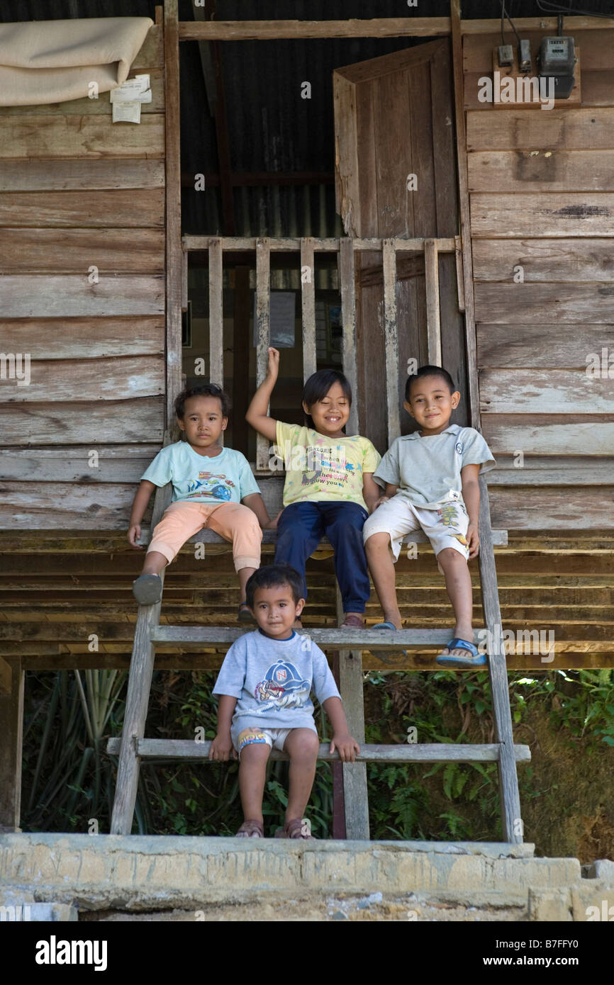 Four Malay children in a village, Perak, Malaysia Stock Photo - Alamy