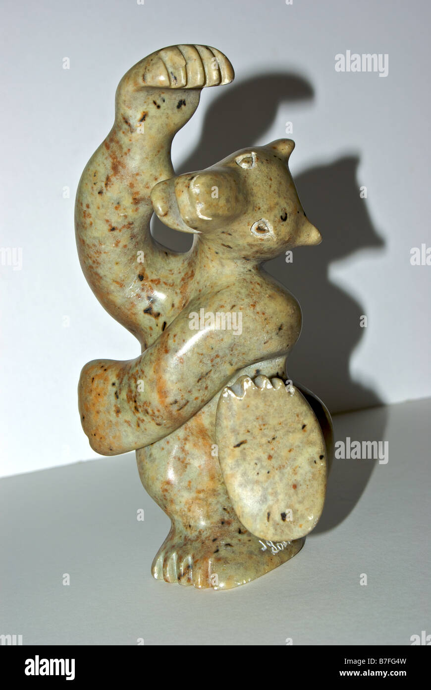 Inuit dancing bears in carved soapstone Stock Photo - Alamy