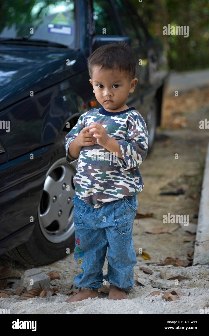 Young Malay boy in a village, Perak, Malaysia Stock Photo - Alamy