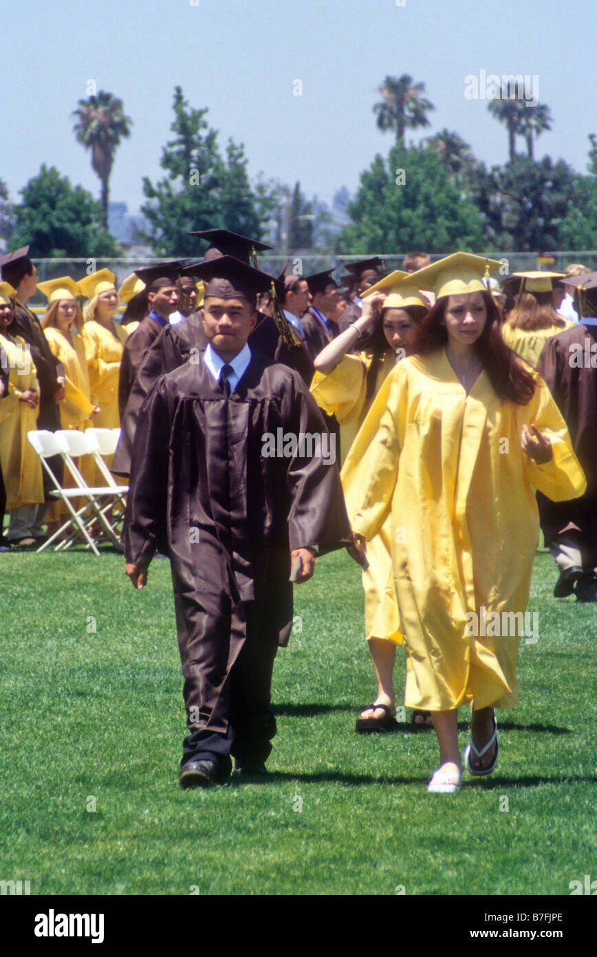 Grads march to get diplomas at high school graduation, California Stock ...