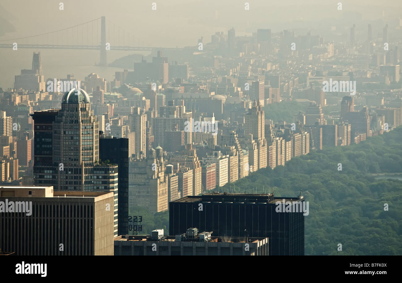 Building lining central park Stock Photo - Alamy