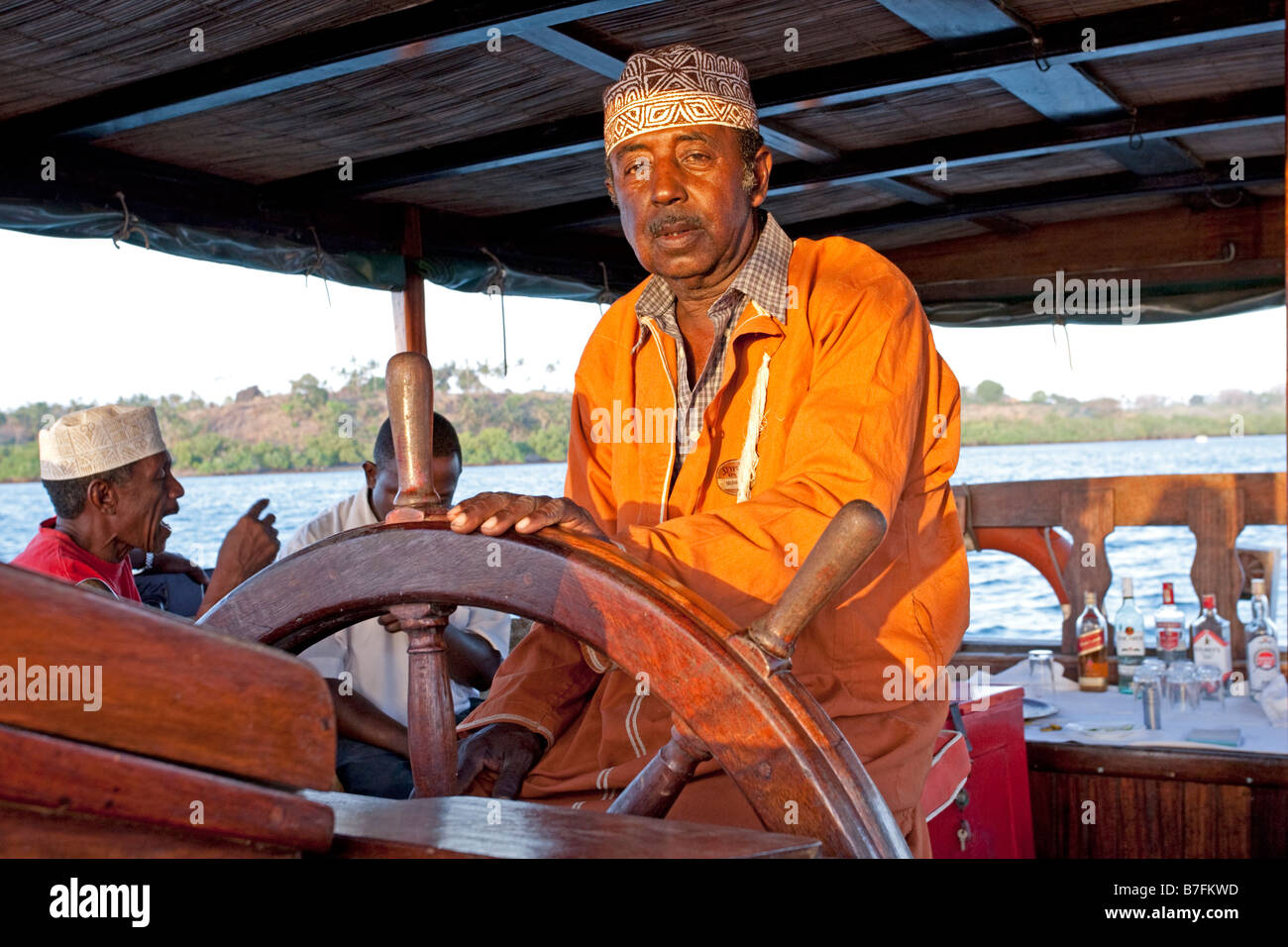 Captain of dhow on evening boat trip from Jahazi Mombasa Kenya Stock ...