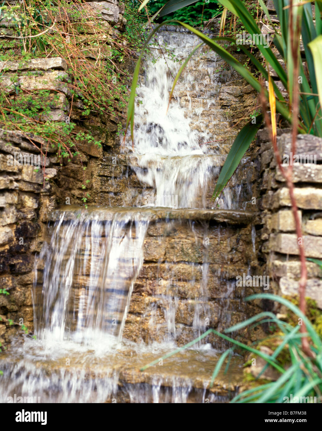 WATERFALL BUILT FROM NATURAL DRESSED STONE AT KNOLL GARDEN Stock Photo ...