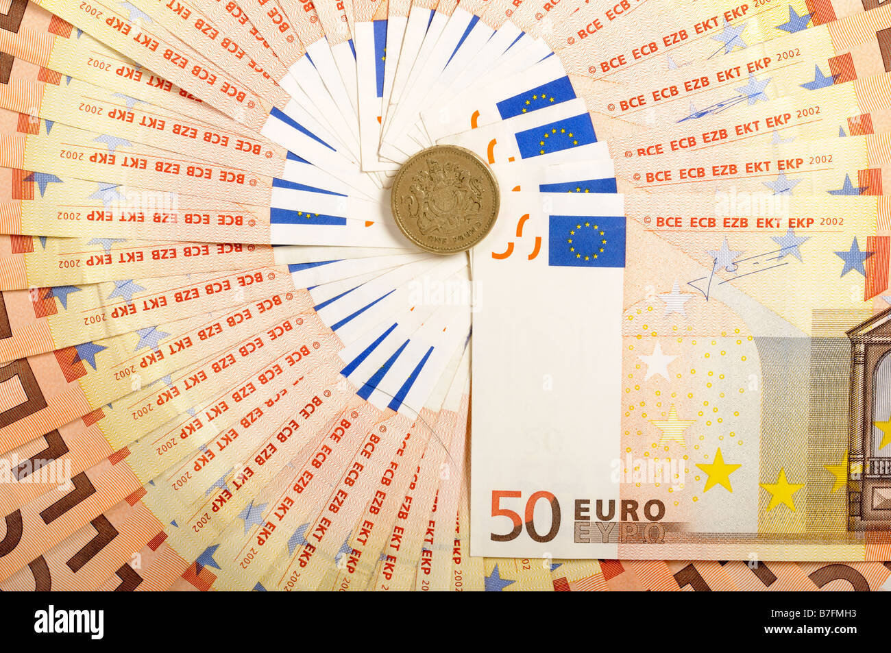 Stock photo of a fan of 50 Euro notes In the centre is a single 1 Euro ...