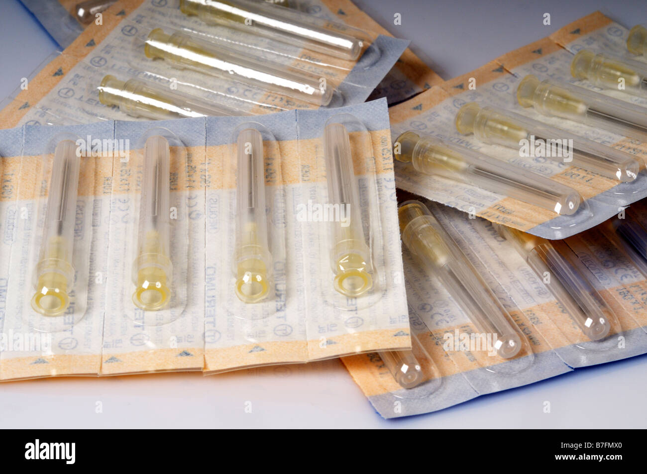 Stock photo of a pile of Hypermic needle packs shot against a white ...