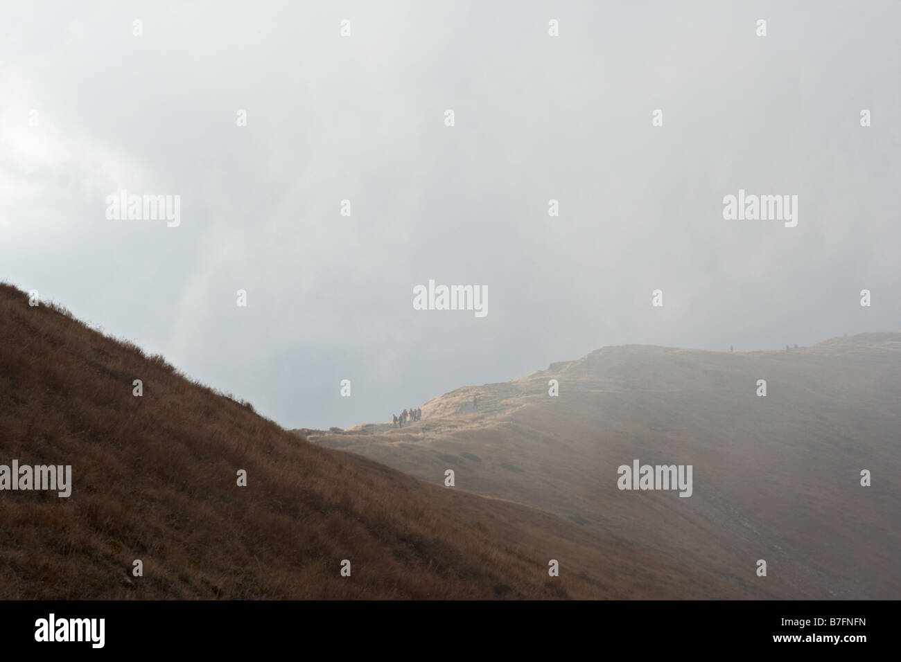 Mountain path in fog Stock Photo - Alamy