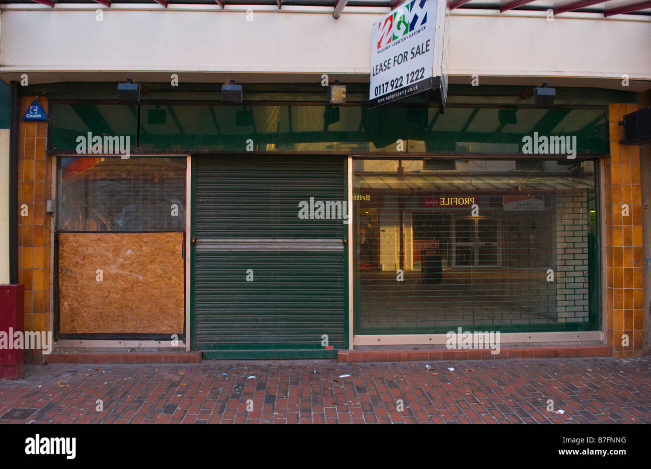 Closed and shuttered shop in town centre of Llanelli Carmarthenshire ...
