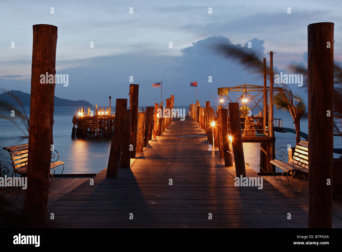 Rawa Island Jetty at dusk with lights Malaysia tropical island Stock ...