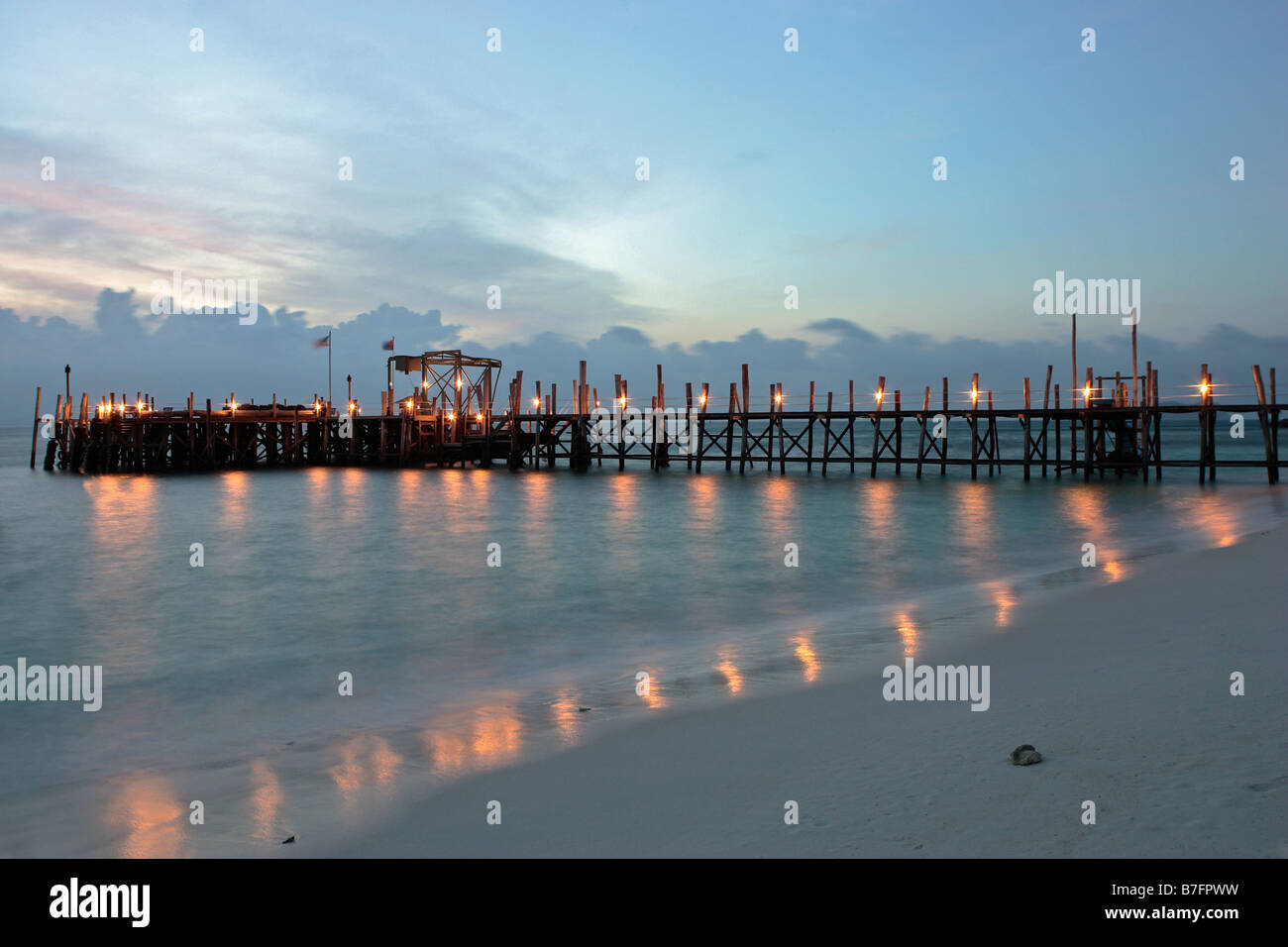 Rawa Island jetty at sunset tropical island Stock Photo - Alamy