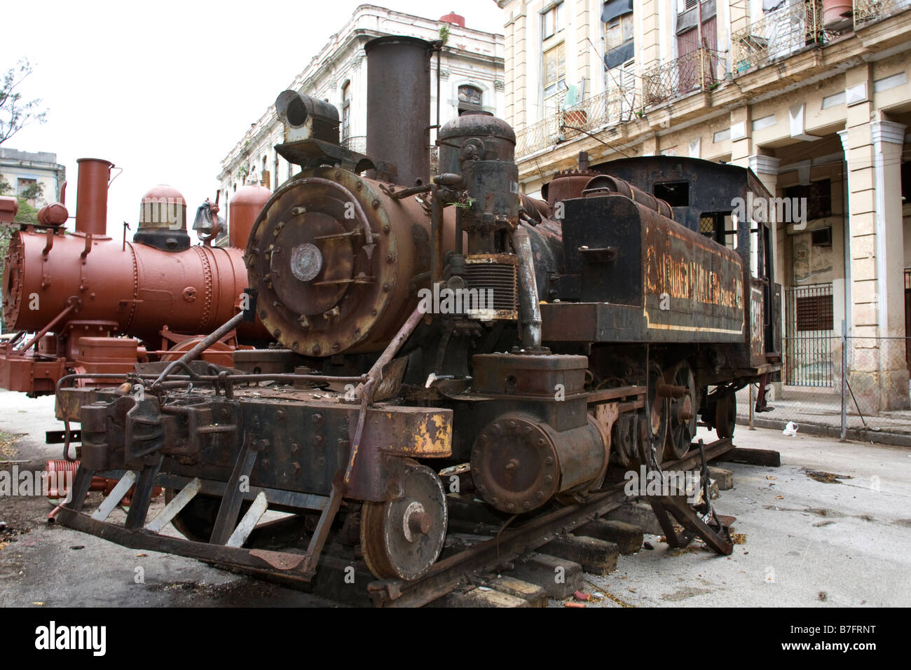 Abandoned steam train engines in residental street of Havana Cuba ...
