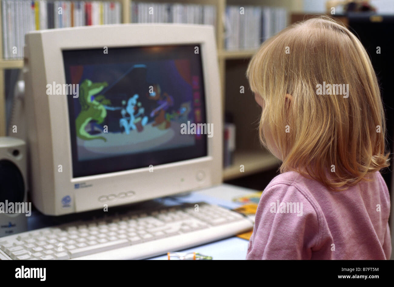 Toddler girl play at personal computer Stock Photo - Alamy