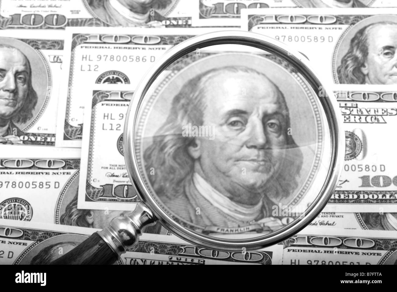 object on white currency magnifying glass with money Stock Photo - Alamy
