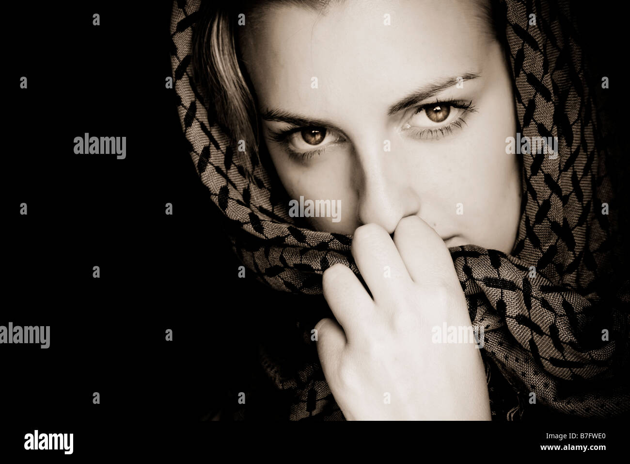 Muslim woman with her face covered Stock Photo - Alamy
