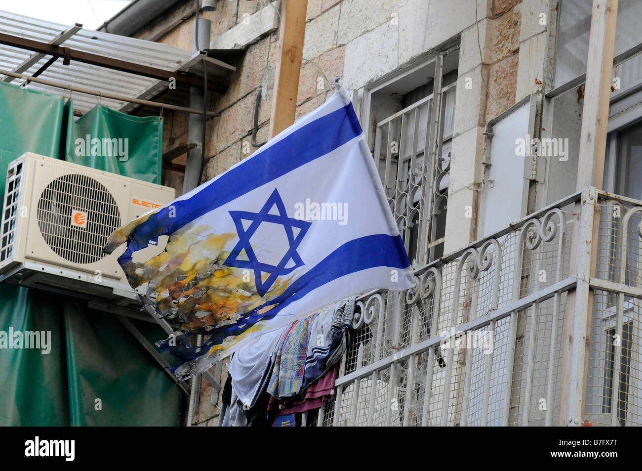 Half burnt Israeli flag in the ultra-orthodox Jewish neighbourhood of ...