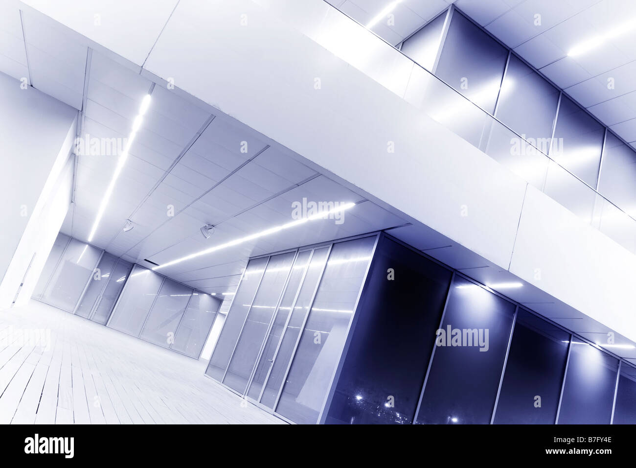 Empty office blue toned Stock Photo - Alamy