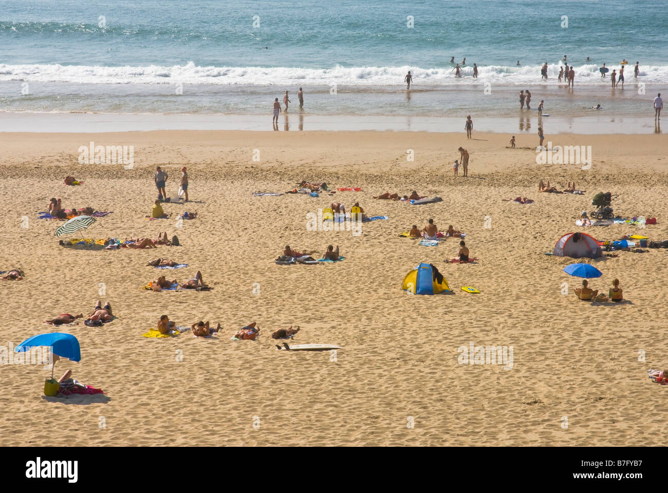 Many people bathing on a beach hi-res stock photography and images - Alamy