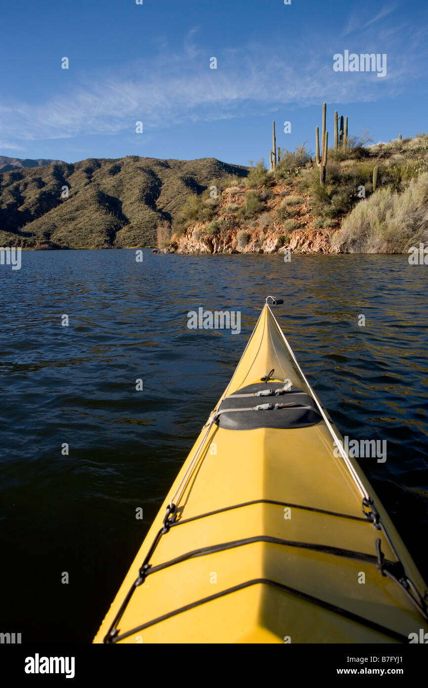 A single yellow kayak on Apache Lake Arizona. Apache lake was formed ...