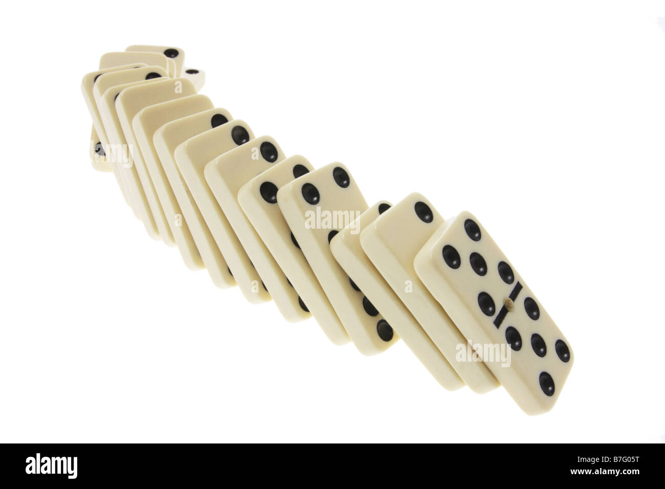 Dominoes falling Cut Out Stock Images & Pictures - Alamy