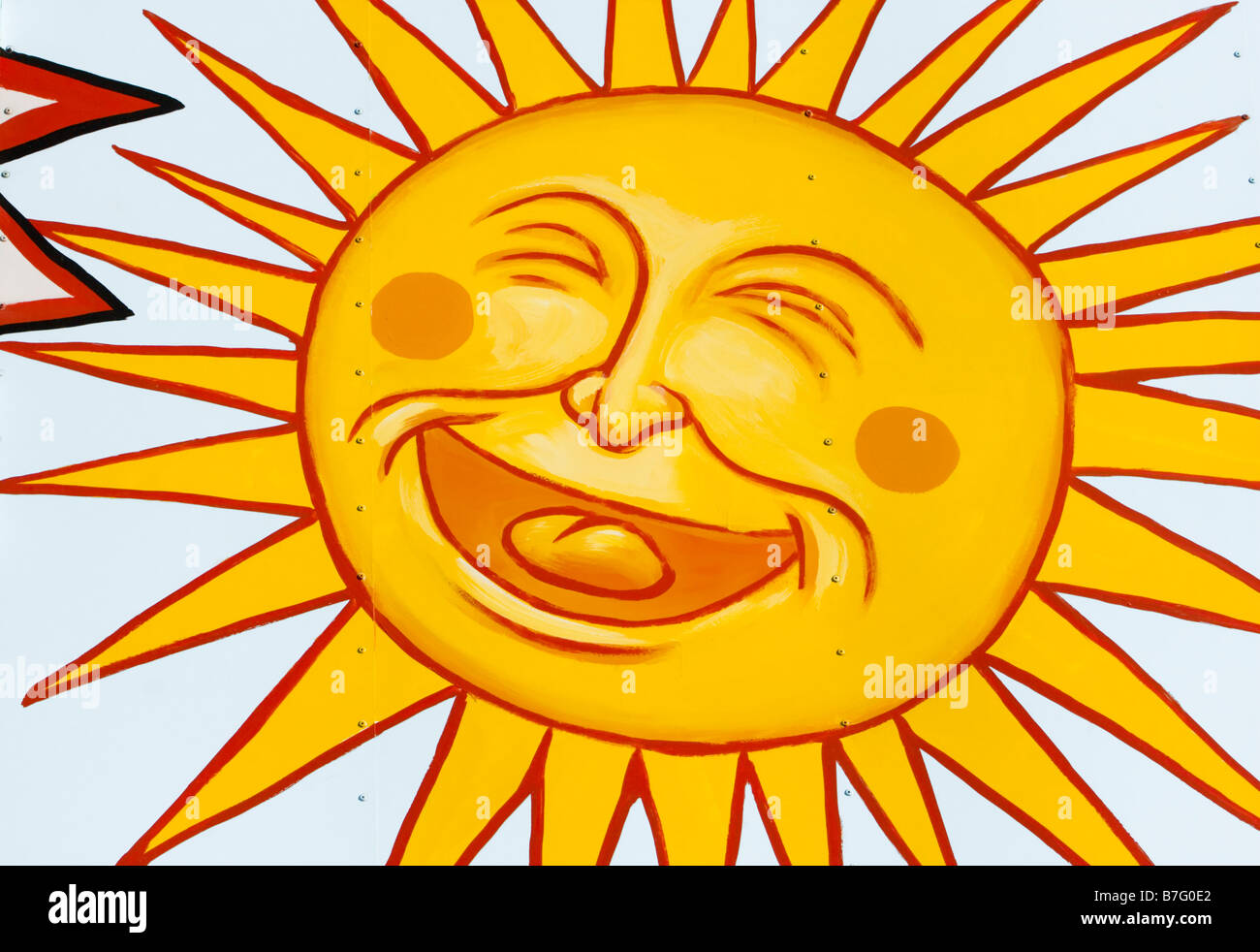 Smiling painted yellow orange sun Stock Photo - Alamy