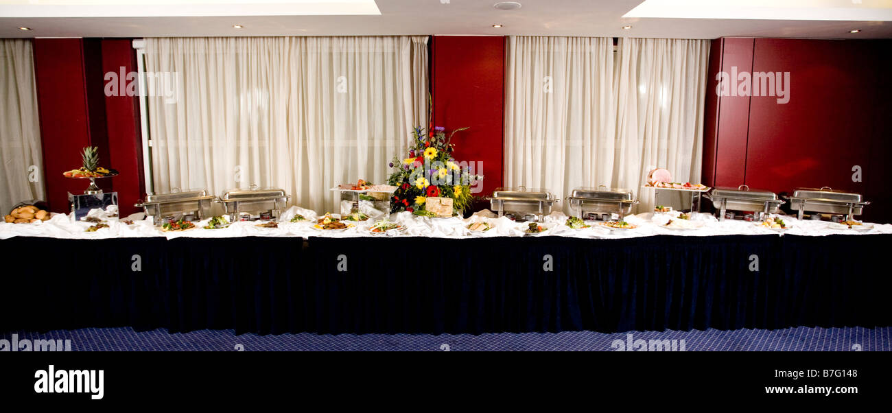 At the buffet table hi-res stock photography and images - Alamy