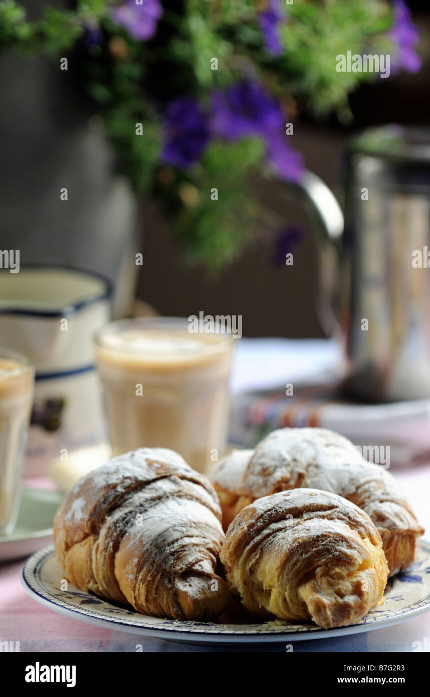 Italian breakfast brioche and caffe latte Stock Photo - Alamy
