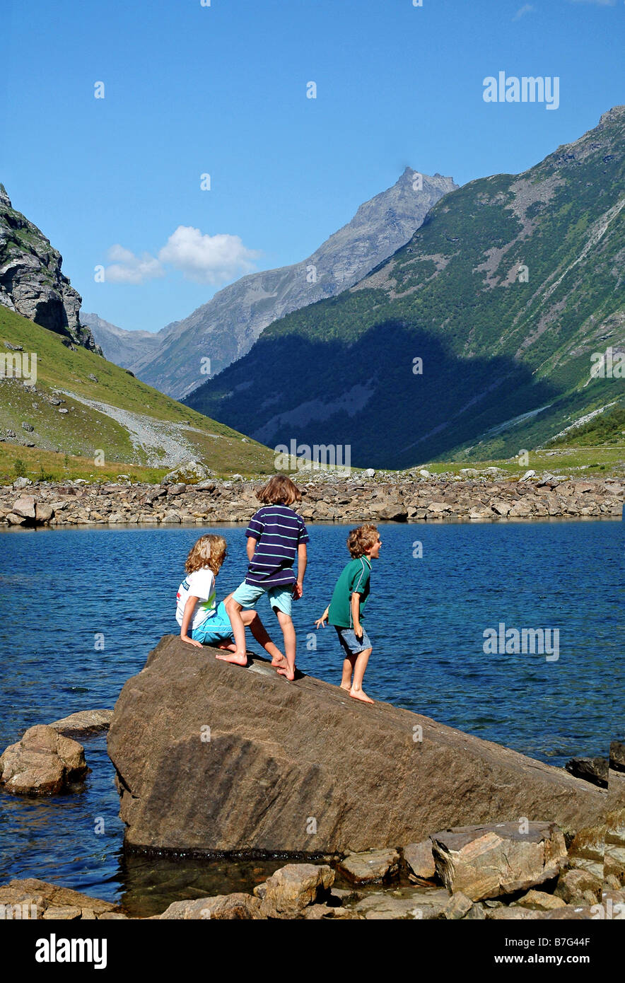 Girls playing on rocks hi-res stock photography and images - Alamy