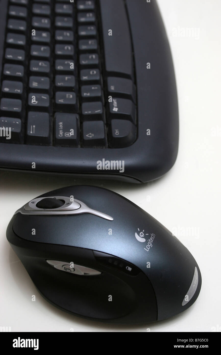 Computer keyboard and wireless mouse on white background Stock Photo ...