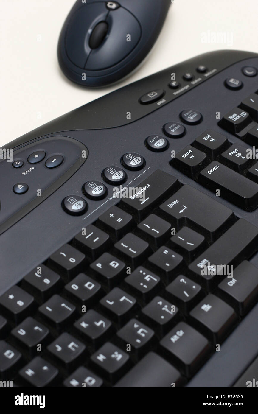 Computer keyboard and wireless mouse on white background Stock Photo ...