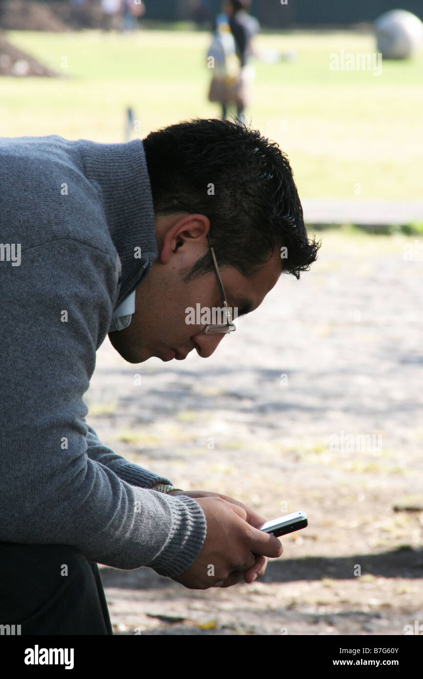Student using a mobile phone Stock Photo - Alamy