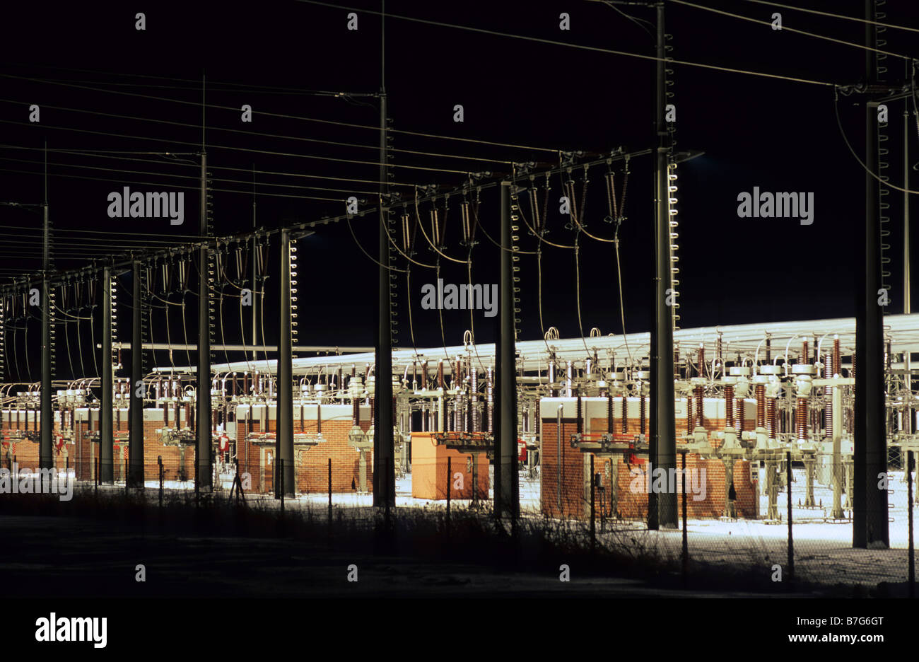 electric power transformation substation at night in Germany; relay ...