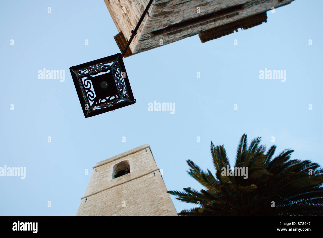 Bell tower with palm tree Stock Photo - Alamy