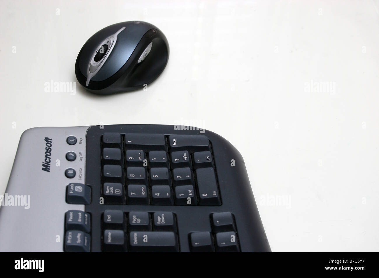 Computer keyboard and wireless mouse on white background Stock Photo ...