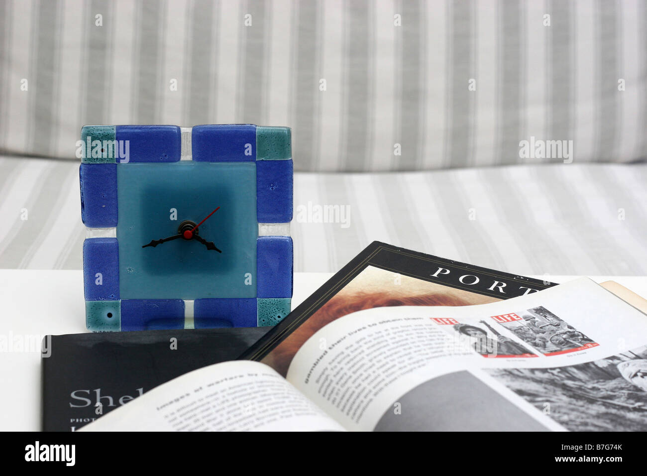 Blue analogue clock Stock Photo - Alamy