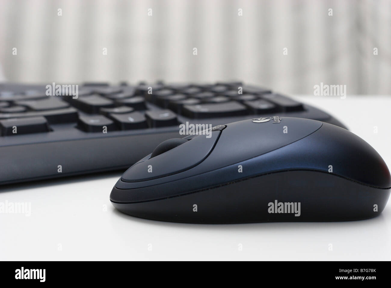 Computer keyboard and wireless mouse on white background Stock Photo ...