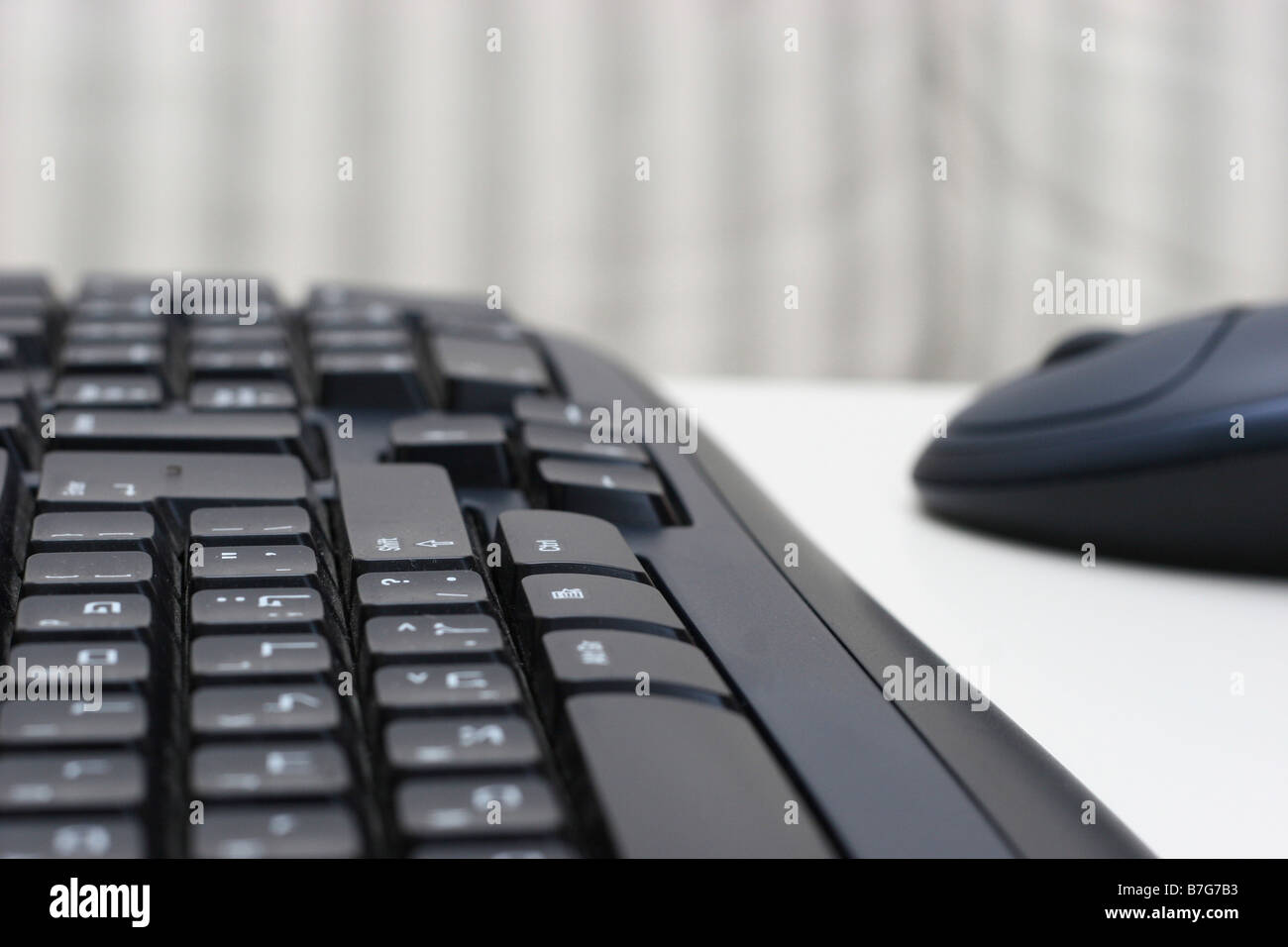 Computer keyboard and wireless mouse on white background Stock Photo ...