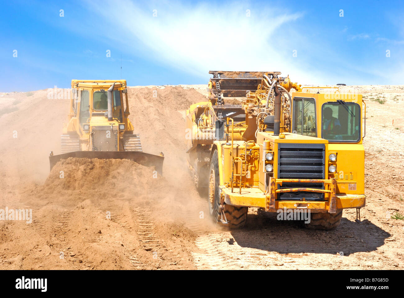 A Pair of Earthmovers Stock Photo - Alamy