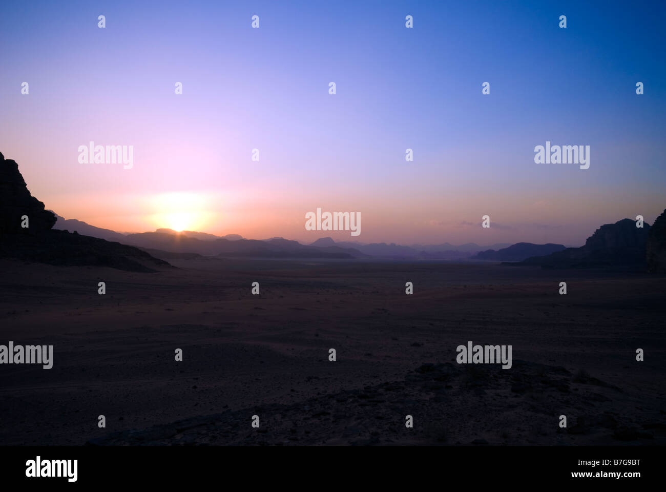 Sunset over Wadi Rum desert Jordan Stock Photo - Alamy