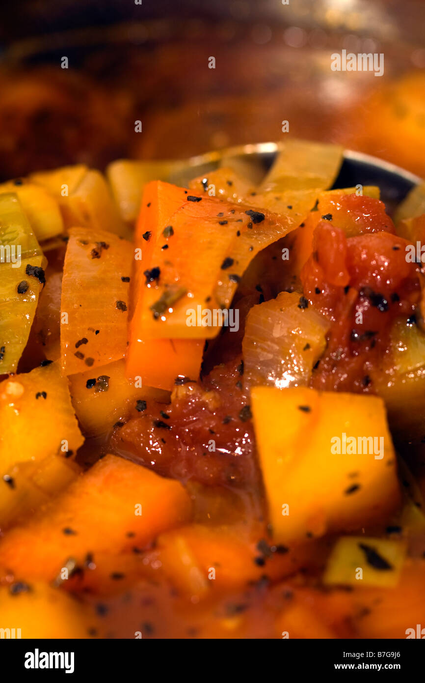 Close-up of vegetable soup cooking in a pan in ladle Stock Photo - Alamy