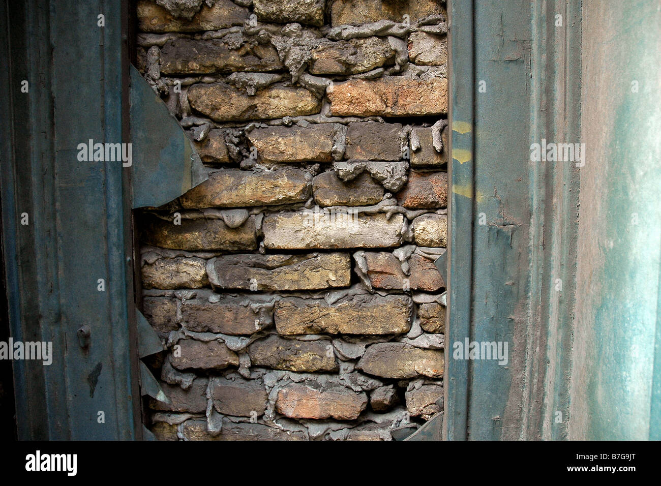 brick wall broken glass Serbia Stock Photo - Alamy