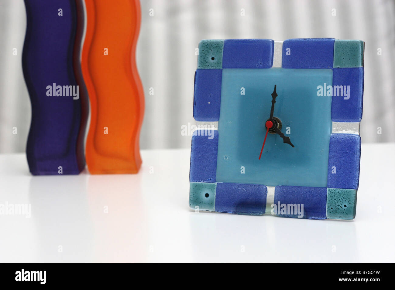 Blue analogue clock Stock Photo - Alamy