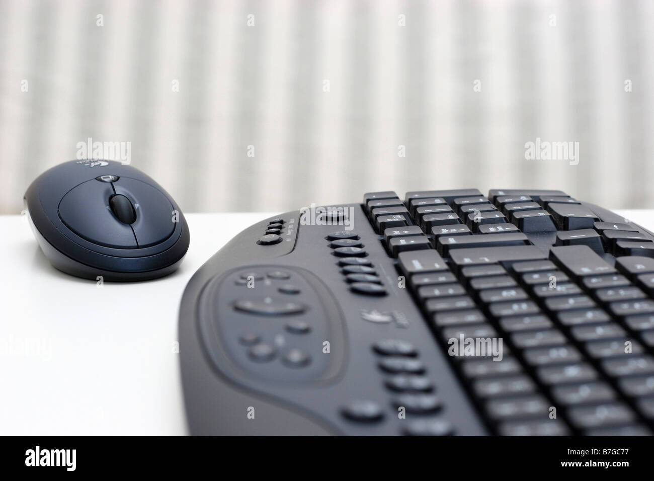 Computer keyboard and wireless mouse on white background Stock Photo ...