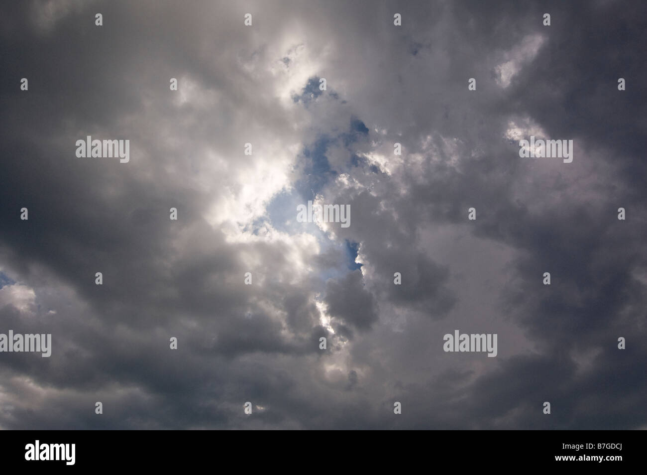 Opening of blue sky through clouds during the full solar eclipse in ...