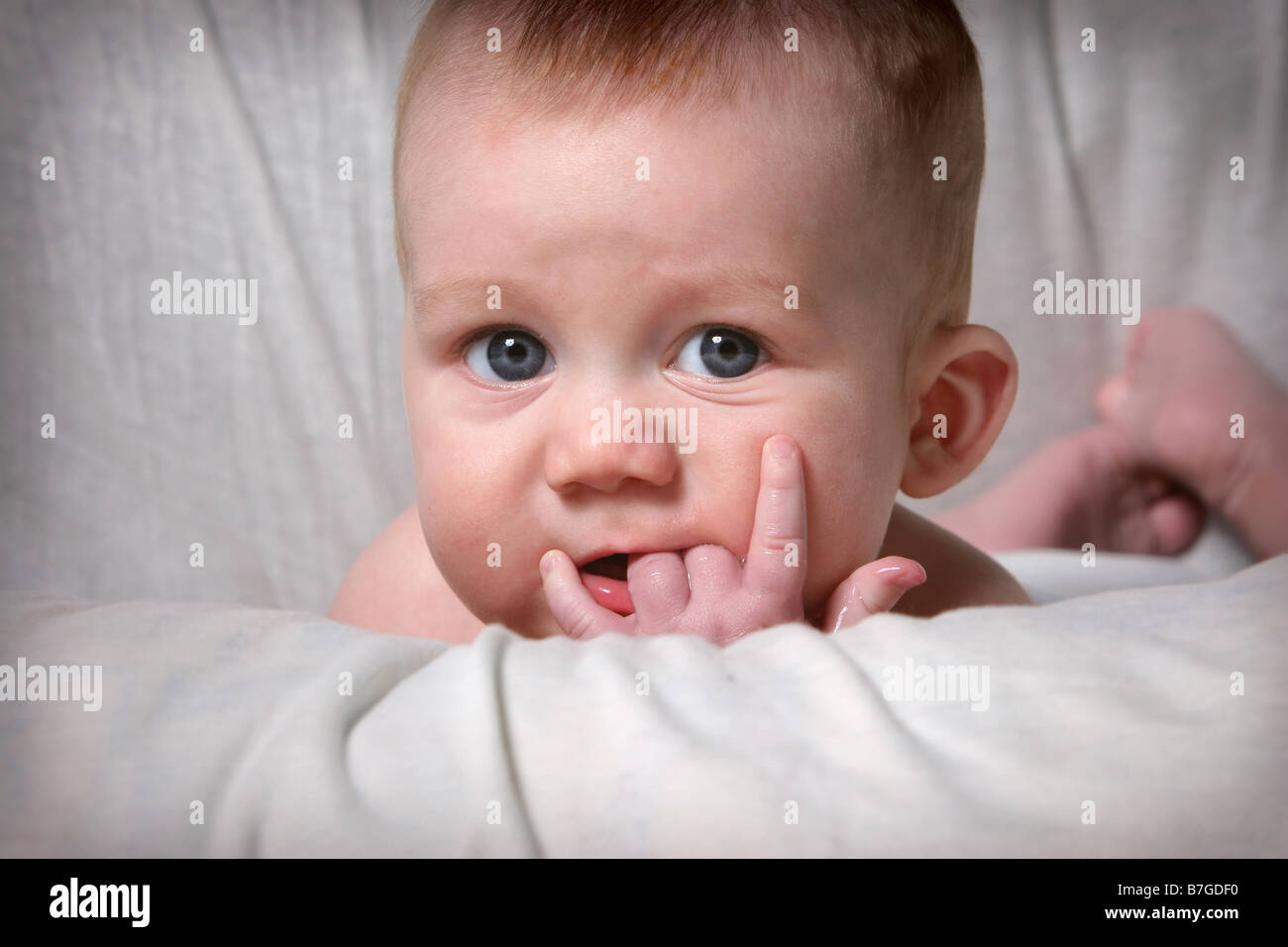 baby giving rock on symbol Stock Photo - Alamy