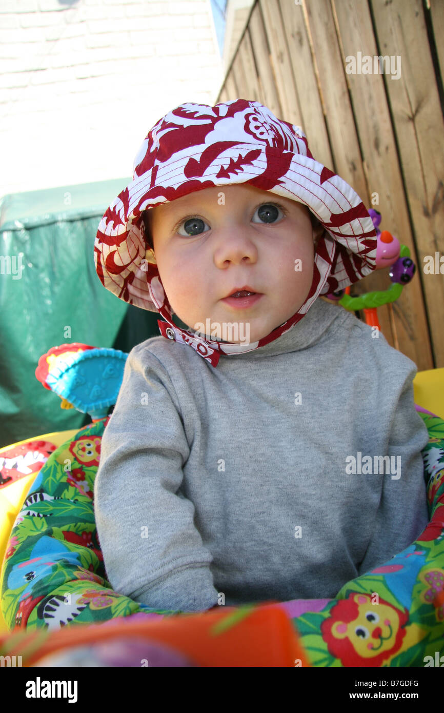 child playing in jumper outside Stock Photo - Alamy