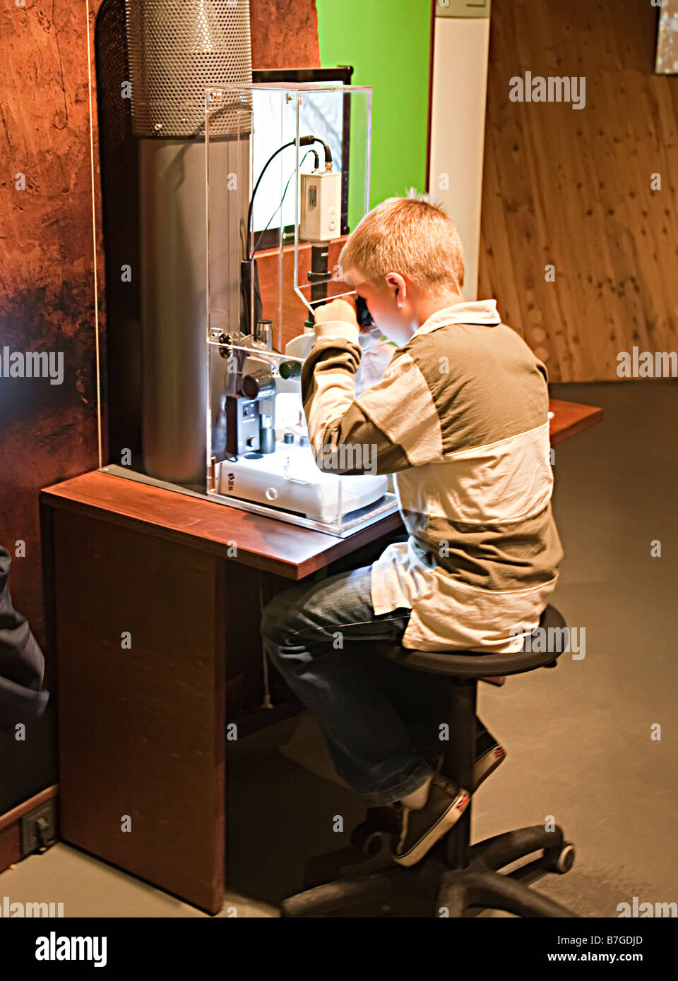 Boy using microscope in museum display Muritzeum Waren Germany Stock ...